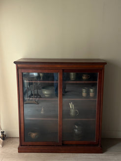 Glass sliding door display case – Good Behavior