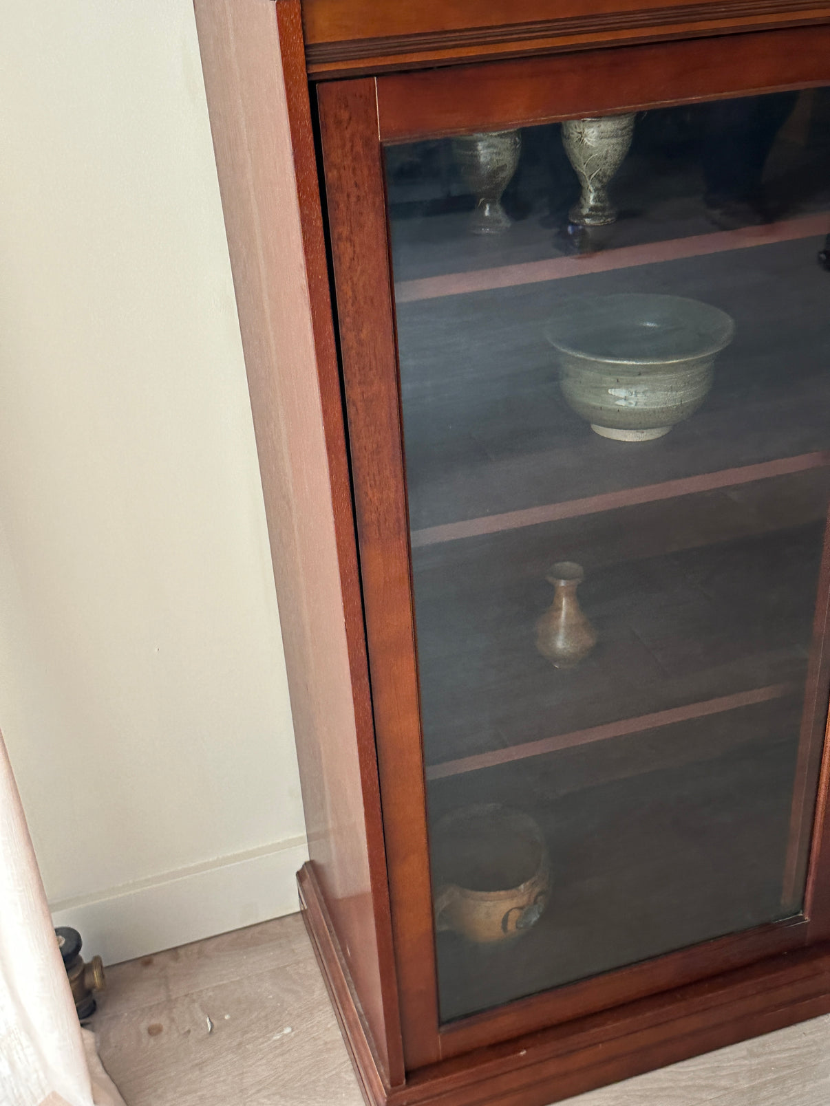 Glass sliding door display case – Good Behavior