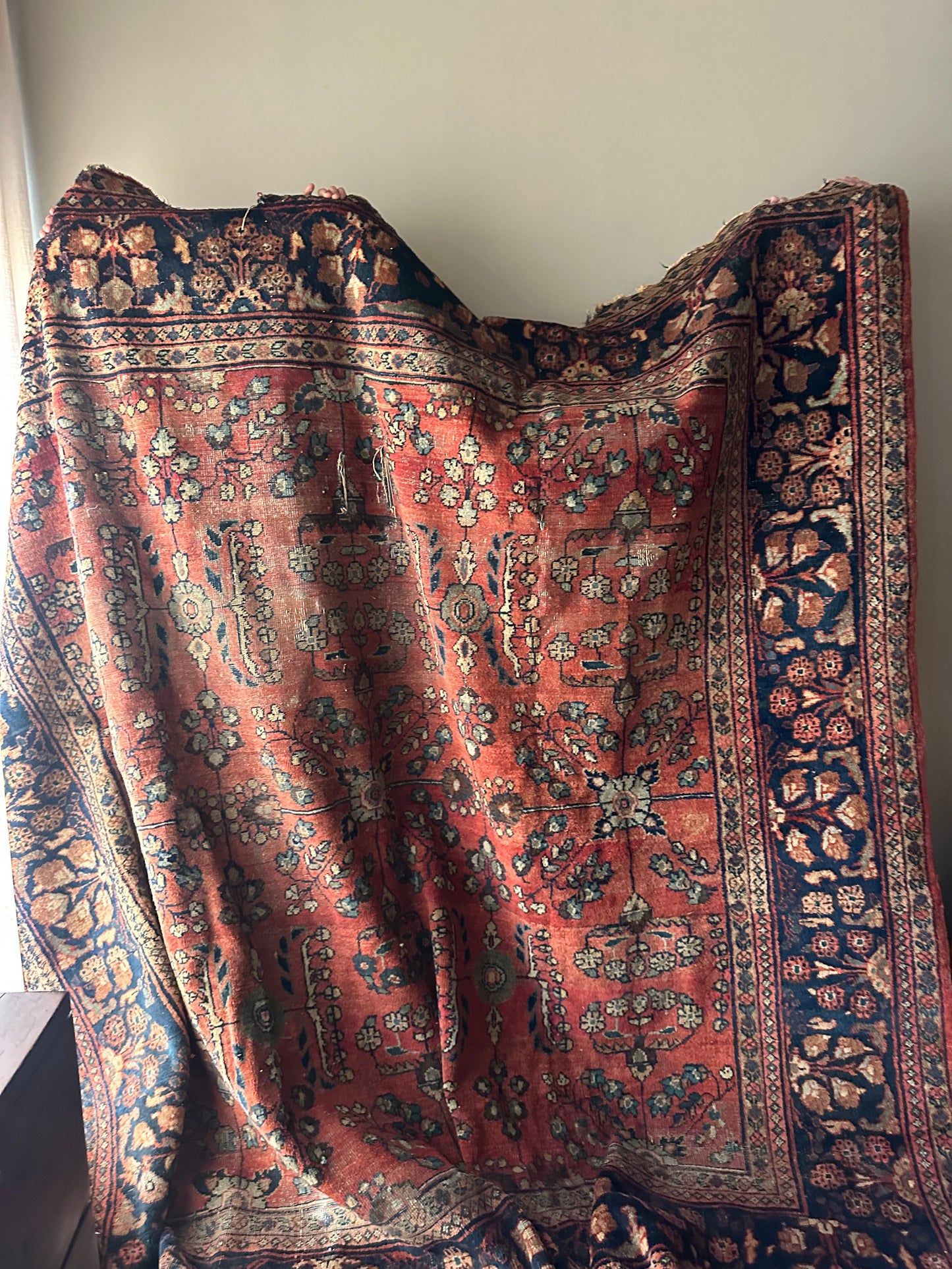 Large rug with some rips – Good Behavior