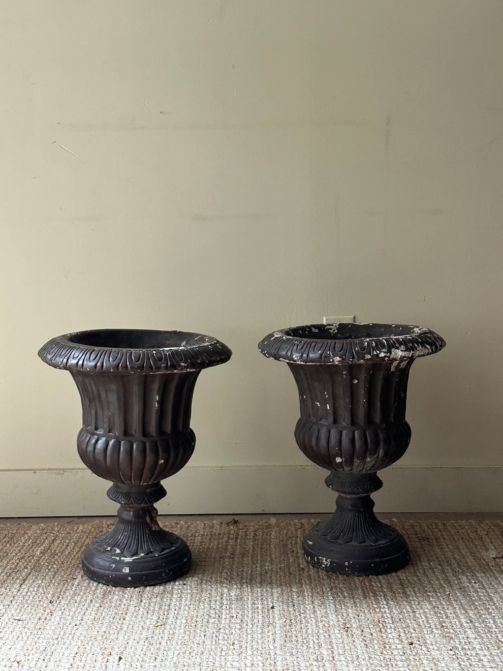 Dark Brown Concrete urns – Good Behavior